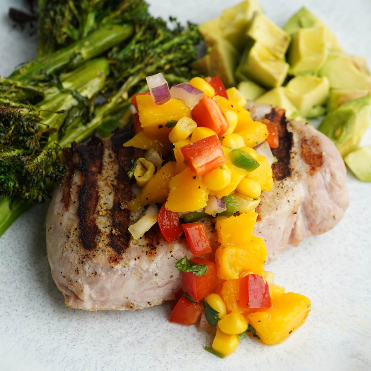 Grilled Pork Chops with Mango Corn Salsa - Legends of the Grill
